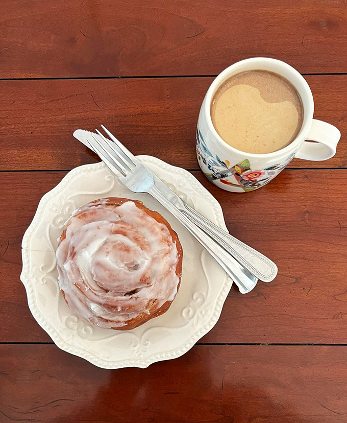 The breakfast of champions, or at least of those who know how to start the day right. This cinnamon roll and coffee combo is like a warm hug for your taste buds.