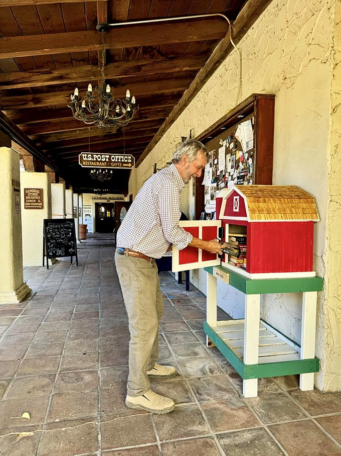 Curiosity didn't kill the cat, but it might make you buy a barn! This gentleman's fascination with the quirky decor mirrors our own childlike wonder.