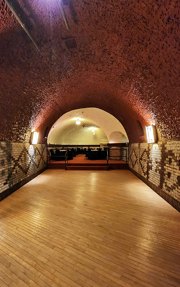 From speakeasy to soiree central! This gleaming walkway leads to a hidden world where swing dancers and history buffs alike can cut a rug.
