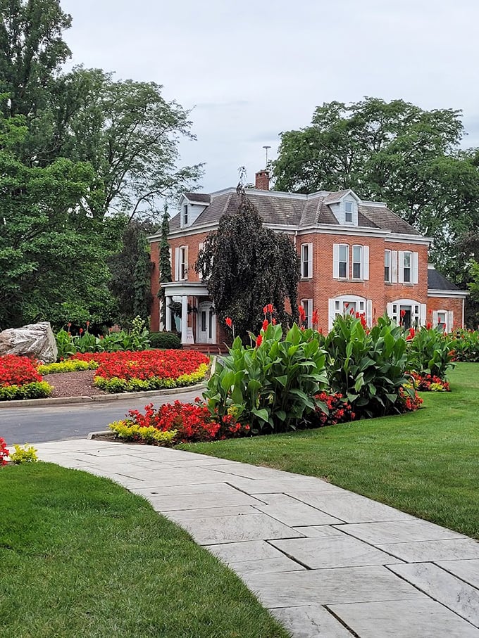 Follow the floral-lined path. This inviting walkway promises delightful discoveries with every step you take.