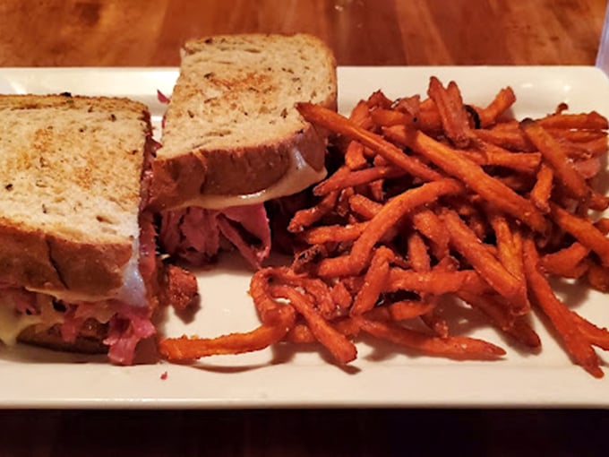 This Reuben isn't just a sandwich; it's an edible work of art. Picasso would be jealous (and hungry).
