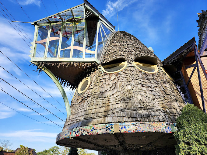 Up, up, and away! This glass-topped turret looks ready to blast off into a world of pure imagination.