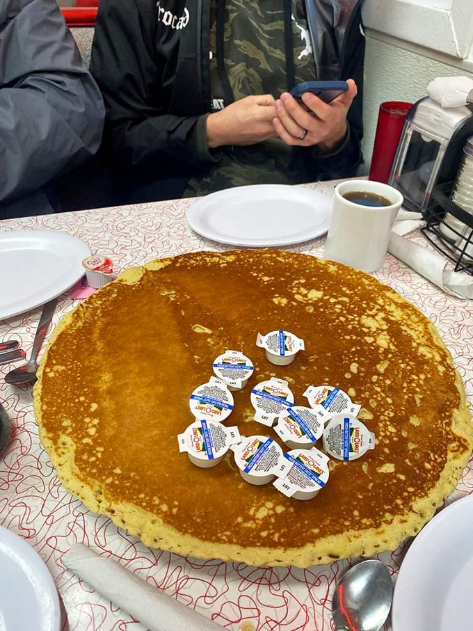 Is it a pancake or a solar eclipse? Charlie Parker's famous flapjack is so big, it comes with its own area code.