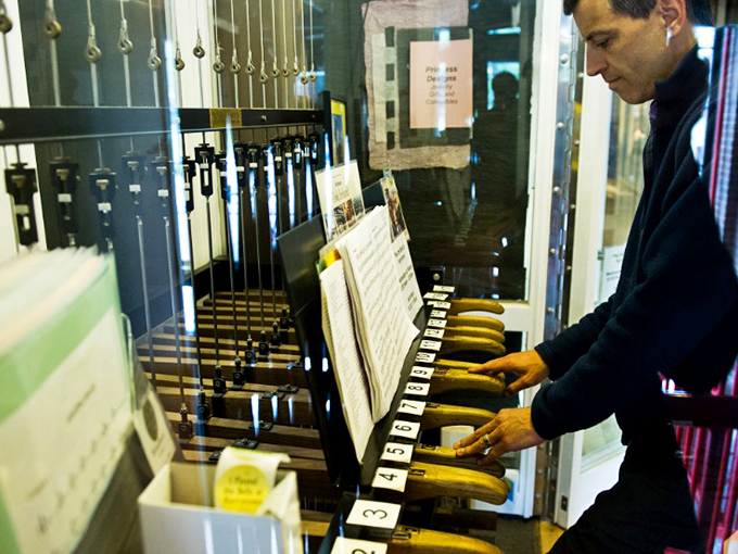 Hands-on music making at its finest! Watch as skilled fingers dance across the chime's keys, bringing melodies to life.