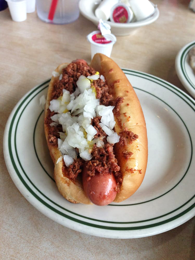 The Flint Coney: Where beefy dreams and onion-topped wishes come true. A local legend that's worth every savory, messy bite.