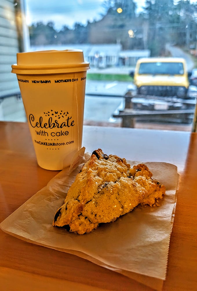 Scone with a view! This golden triangle of joy pairs perfectly with a steaming cup of liquid motivation.