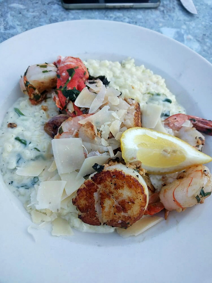 Seafood risotto that's creamier than a lobster's wildest dreams. It's like the ocean and a Italian nonna got together and created the ultimate comfort food.