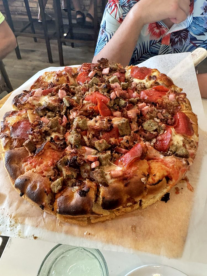 Holy moly, would you look at that Sicilian pizza? It's a flavor fiesta so enticing, you'll be tempted to frame it instead of eat it. Almost.