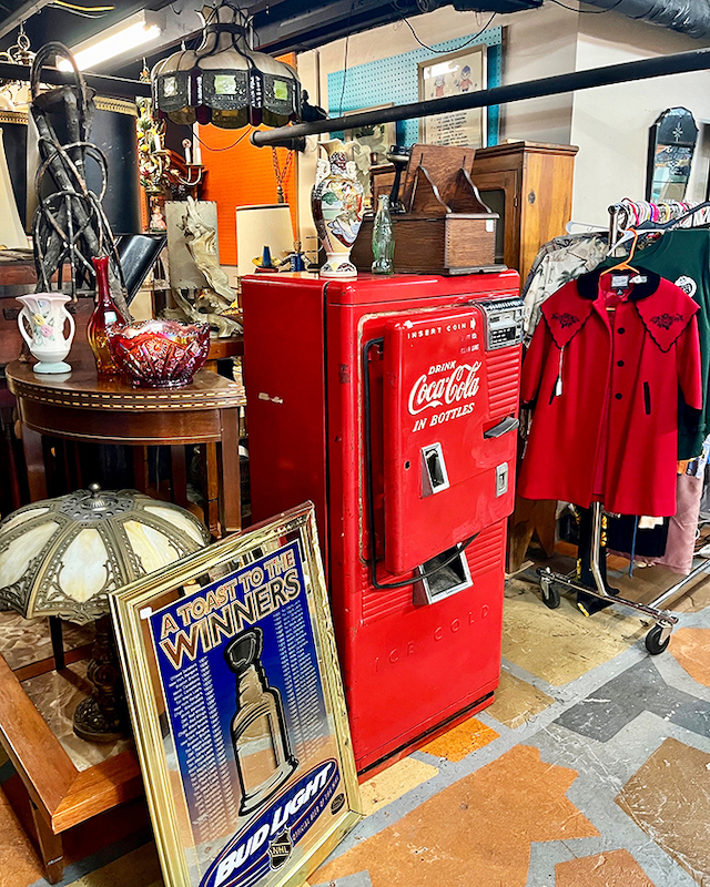 Holy pop culture, Batman! From Coca-Cola to kitschy art, this corner is a nostalgic fever dream come to life.