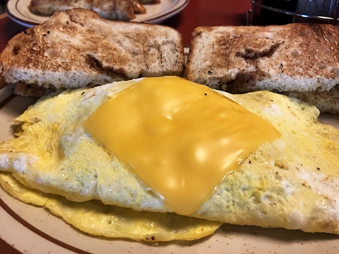Behold the Western omelet, a cheese-draped masterpiece that screams "Good morning!" louder than your alarm clock ever could. Rise and shine, taste buds!