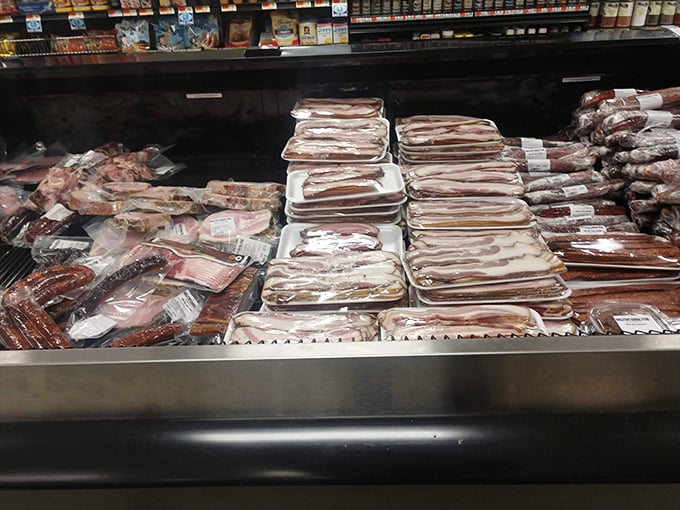 Bacon me crazy! This meat case is a pork lover's paradise, showcasing slices so perfect they could make vegetarians question their life choices.