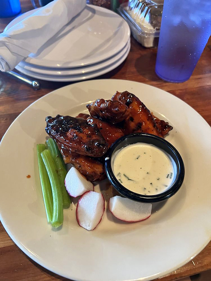 Wings so finger-lickin' good, you'll want to high-five the chef! Paired with crisp veggies and cool dip, it's a flavor party your taste buds won't want to leave.