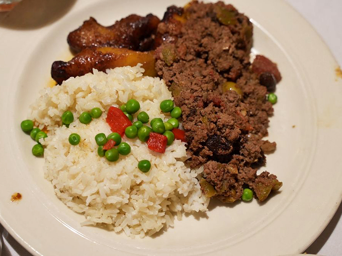 Rice, rice, baby! This hearty plate is comfort food with a Spanish twist. It's like a warm hug for your stomach, but with better seasoning.