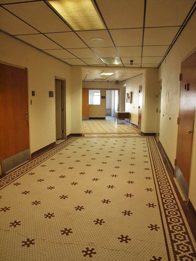 "The hallway of a thousand stories." Each tile could tell a tale, if only walls (or floors) could talk. A time capsule frozen in linoleum!