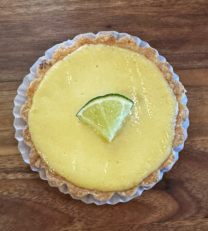 Pucker up, buttercup! This key lime tart is zestier than a Florida retiree at a Jimmy Buffett concert.