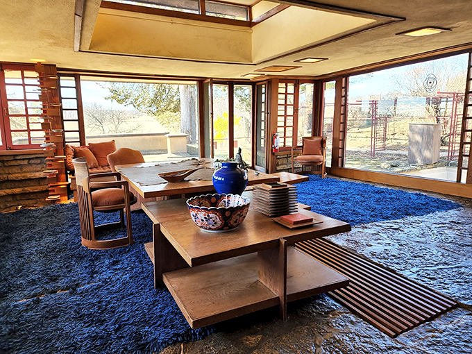 The lounge where 'Netflix and chill' meets 'ponder the universe.' Wright's living room is comfier than your favorite pair of cheese-themed socks.