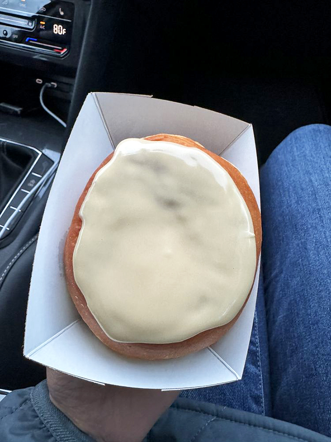 Holy hole-y delight! This maple-glazed donut looks like it could solve all of life's problems, one bite at a time.