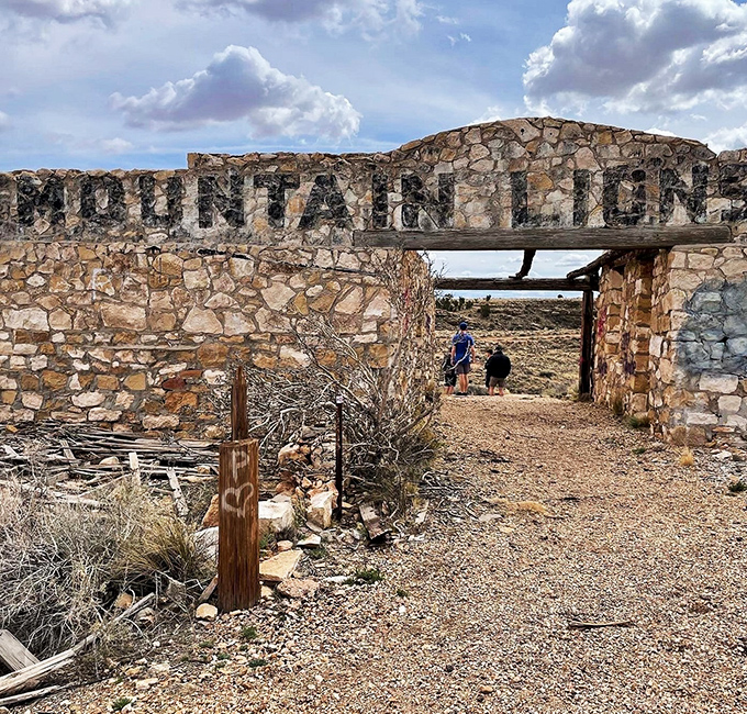 "Mountain Lions Den" carved in stone above the entrance stands as a reminder of Two Guns' quirky roadside attraction days.