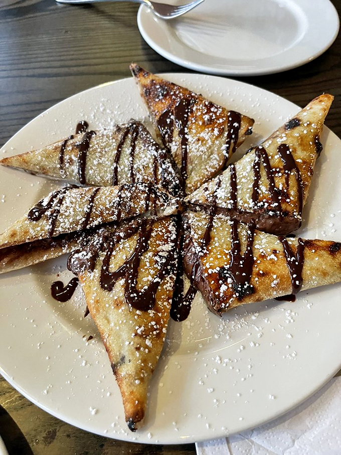 Pizza for dessert? Oh yes, we did! This Nutella-drizzled beauty is what happens when Italy and your childhood dreams have a delicious love child.