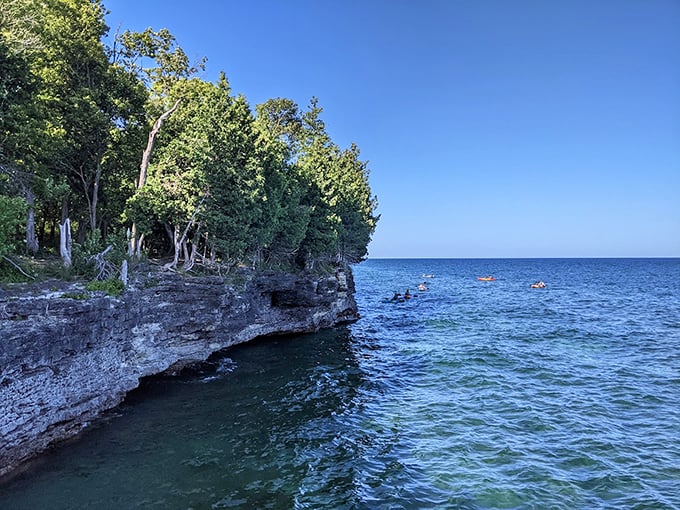 Road trip scenery level: Expert. Cave Point offers Lake Michigan views that'll make you forget you're not in a postcard.