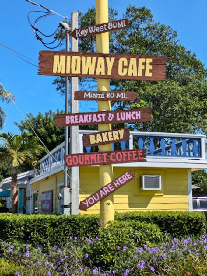 Midway Cafe sign: Midway Cafe: Where coffee meets key lime in perfect harmony. It's like a beach vacation in your mouth!