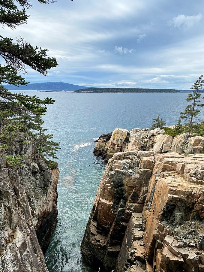 Waves meet granite in a spectacular showdown. Spoiler: They're both winning.