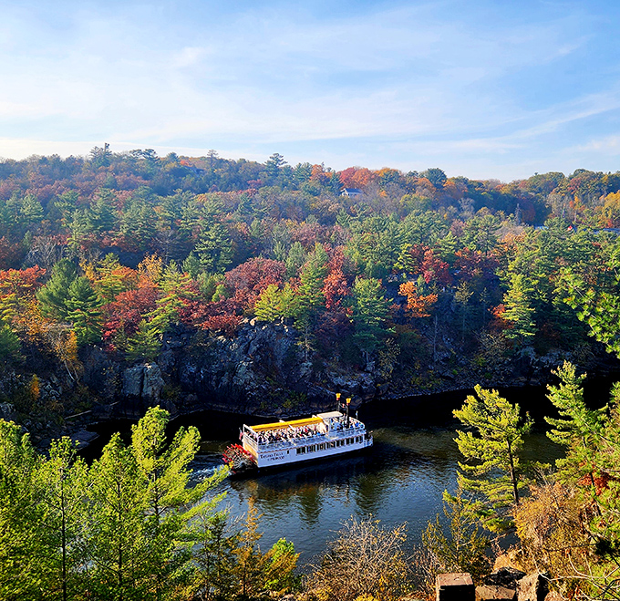 When fall colors explode around the river gorge like this, every seat on the boat becomes the best seat.