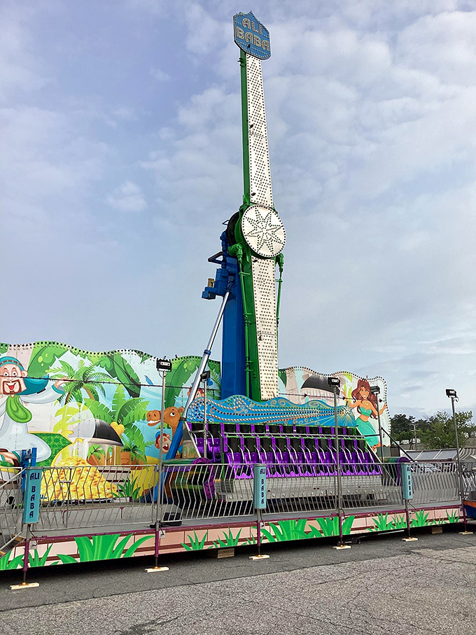 Sky-high pit stop! This towering ride at Smokey's Greater Shows will elevate your road trip to new heights.
