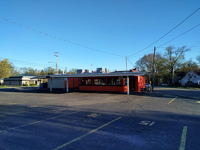Time warp alert! Step into this orange oasis for a sip of the past.