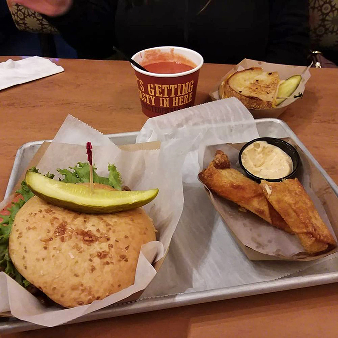 The "It's Getting Tasty in Here" cup says it all! This hearty sandwich and crispy sides are a flavor fiesta waiting to happen.