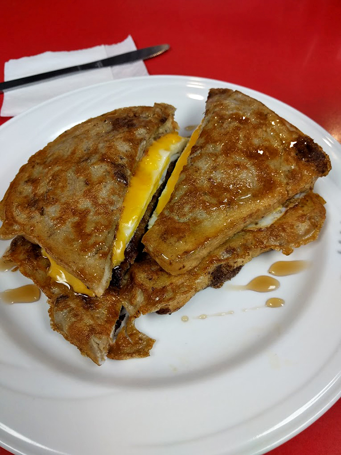 Behold, the breakfast sandwich that puts your sad desk lunch to shame. It's a tower of morning glory!