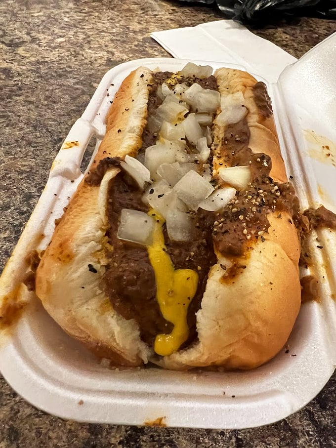 Chili, cheese, and dreams! This coney dog is dressed to impress, like it's headed to the Met Gala of fast food.