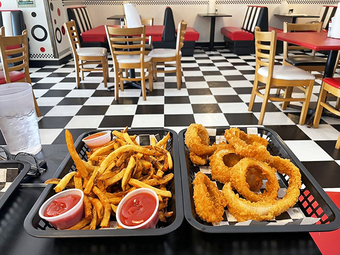 Crispy, golden, and utterly irresistible. These fries and onion rings are the supporting actors that steal the show every time.