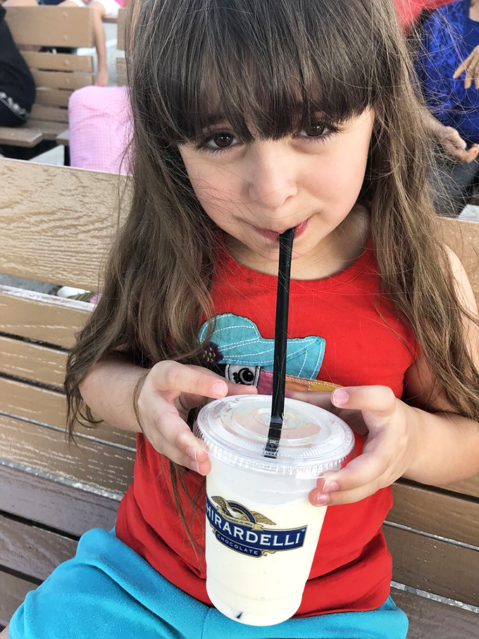 Behold, the Leaning Tower of Deliciousness! This gourmet milkshake is stacked higher than your grandma's photo albums and twice as sweet.