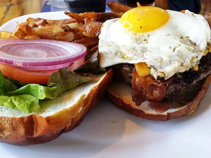 Pretzel logic: When ordinary buns just won't cut it. Kuma's signature pretzel bun cradles a burger that's ready to rock your world.
