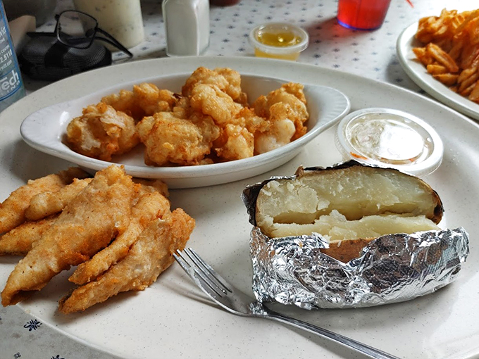 A plate that screams "Wisconsin!" louder than a Packers fan on game day. Perch and potatoes: a match made in comfort food heaven.