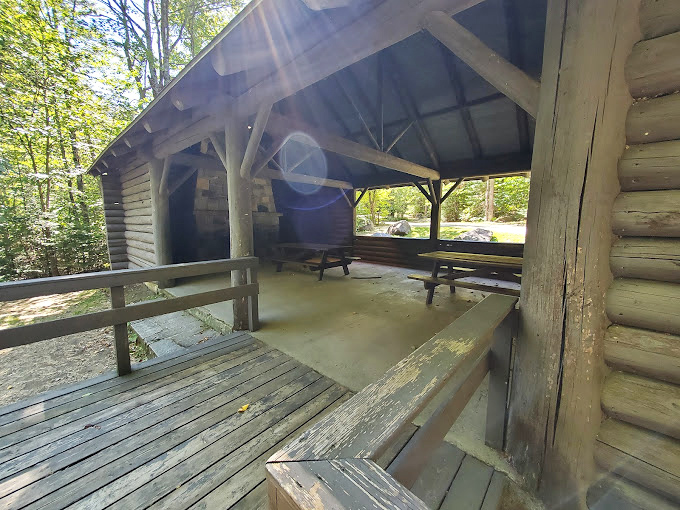 Rustic relaxation station: This picnic spot offers a feast for the eyes and your sandwich. Bob Ross would call it a "happy little shelter."