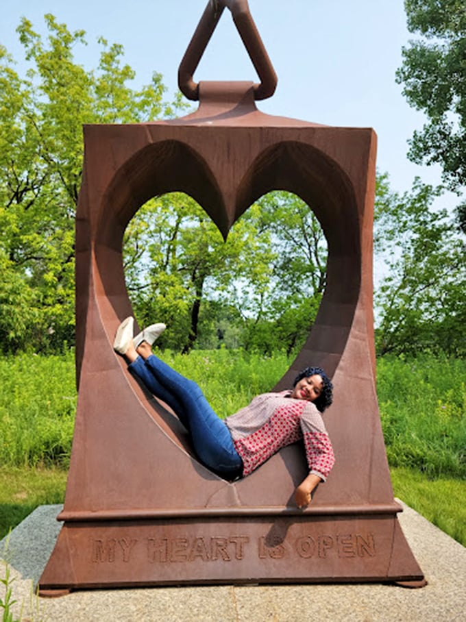 "My heart is open" - and so is this quirky sculpture! A perfect spot for yoga enthusiasts or those who just love a good stretch.