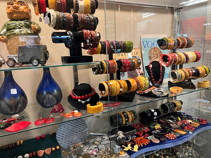 Bangles, baubles, and beads, oh my! This accessories display is a kaleidoscope of vintage bling. Warning: May cause spontaneous disco dancing.