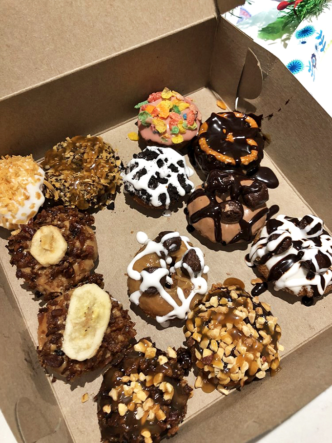 Sugar rush central! These donuts are so beautifully decorated, they could moonlight as edible jewelry in a Willy Wonka remake.