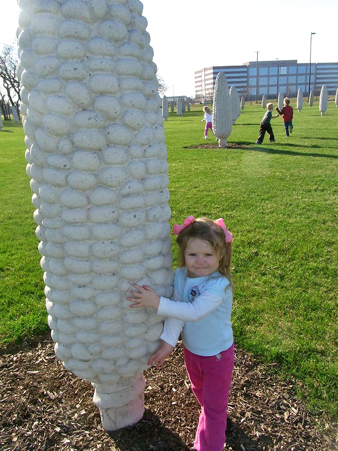"I think we're gonna need a bigger butter dish!" Kids embrace the corny charm of these larger-than-life sculptures.