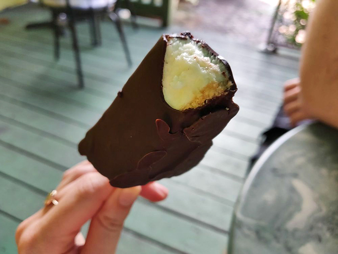 Talk about a glow-up! This chocolate-dipped key lime pie slice is dressed to impress. It's the tuxedo of the dessert world.