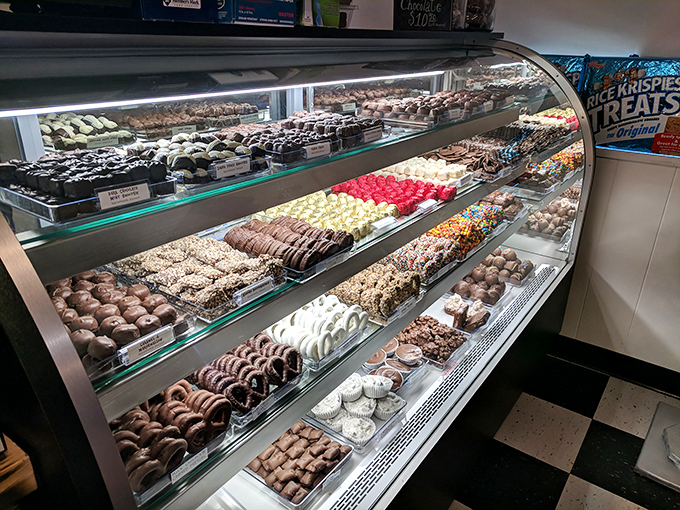 Chocolate heaven on earth! This display case is like a museum of mouthwatering masterpieces, each one begging to be savored.