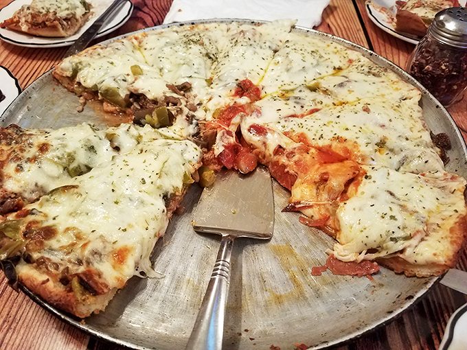 The works, baby! This loaded pizza is like a flavor fiesta where every topping gets an invitation. Let's crash this party!