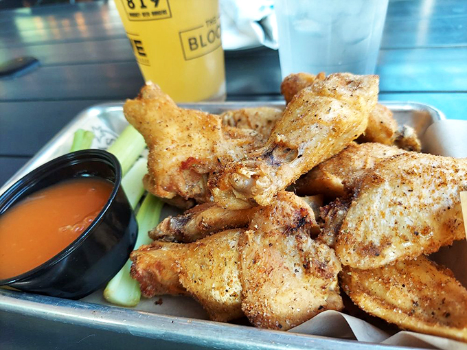 Crispy perfection alert! These wings are the Goldilocks of bar food - not too saucy, not too dry, but just right for finger-lickin' goodness.
