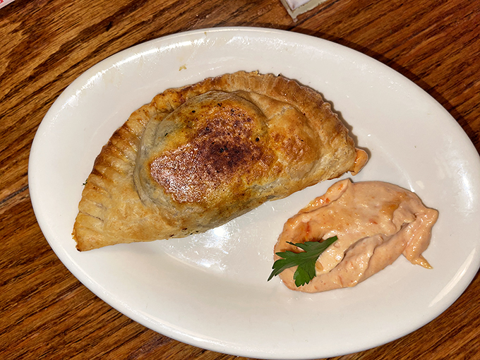 An empanada so good, it deserves its own dipping sauce entourage. Talk about VIP treatment for your taste buds!