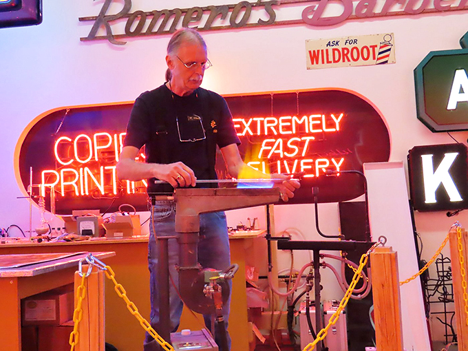 Witness the wizardry behind the glow! This craftsman is like a modern-day Merlin, conjuring magic with glass and gas.