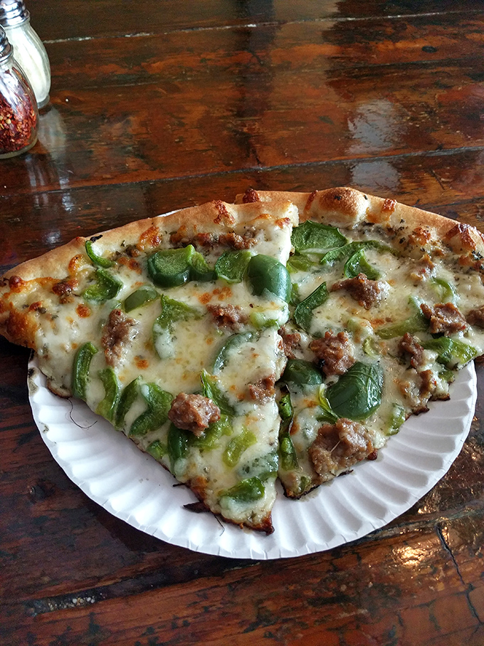 Green machine on a plate! This slice is proof that eating your veggies can be a rebellious act of deliciousness.