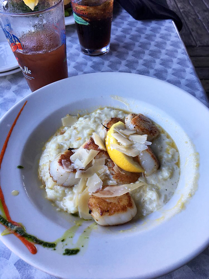 Scallops and risotto: a match made in heaven, or should I say, Davy Jones' locker? This dish is so good, it might just make you consider a life at sea.