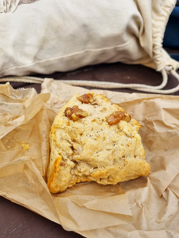 Behold, the Everest of scones! Flaky, buttery, and studded with nuts &ndash; it's the pastry equivalent of a bear hug.